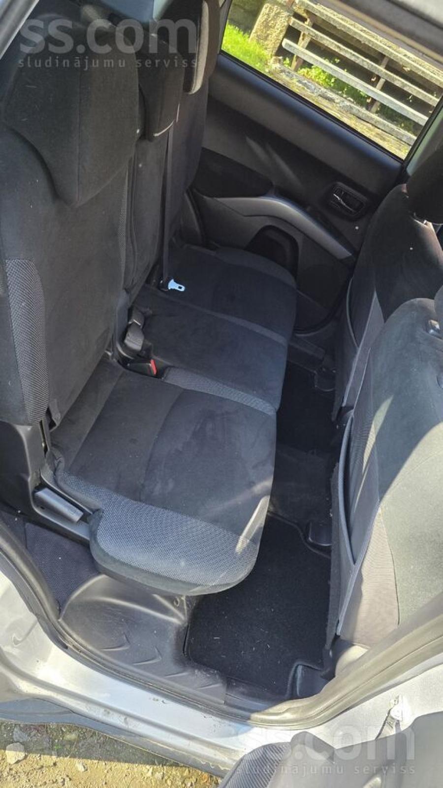 Pelēks Mitsubishi Outlander 2009 Aizkraukle, ar dzinēja tilpumu 2.40 L un nobraukumu 244 tūkst. km par 3800 €, foto 13 vietnē AUTOMOTO.COM.LV