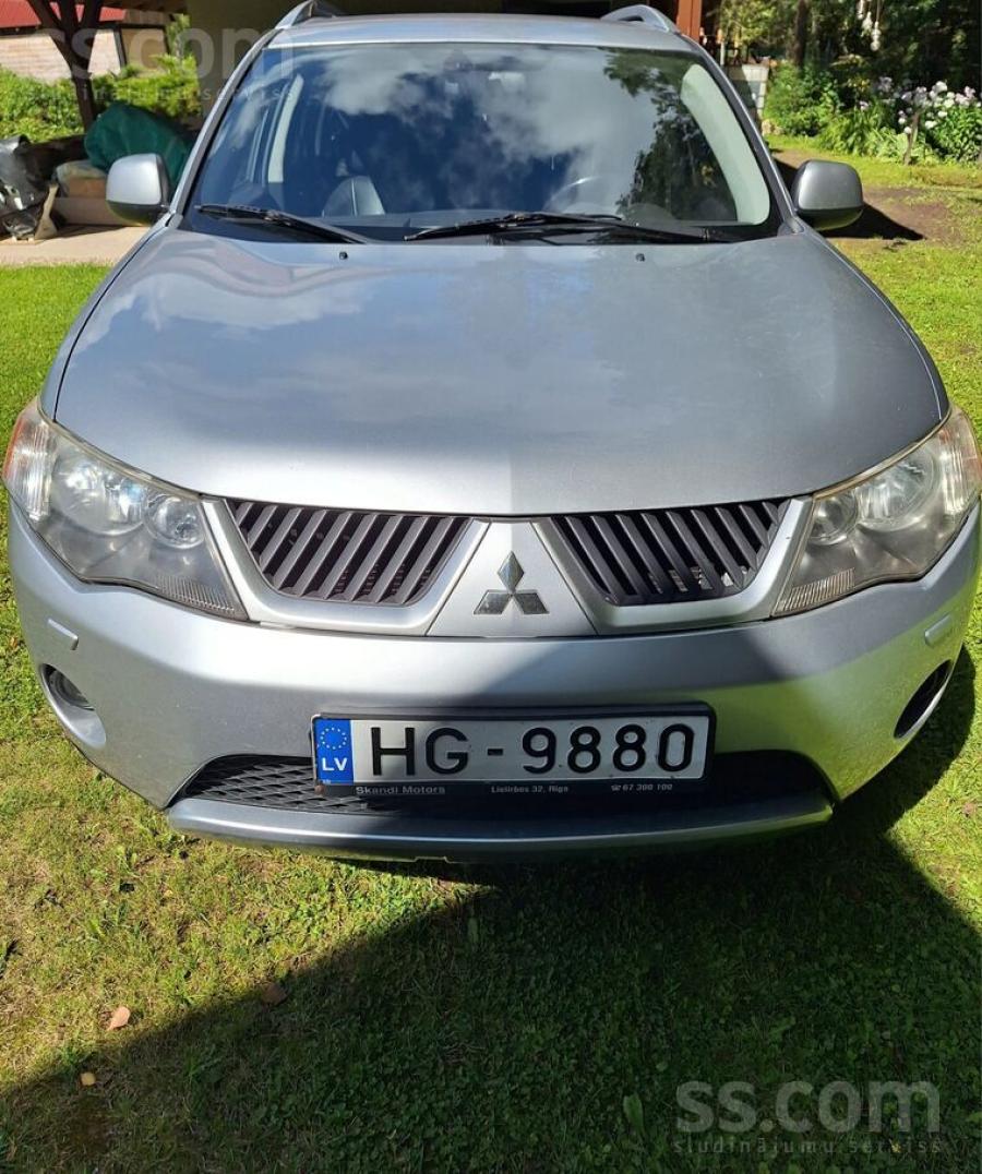 Pelēks Mitsubishi Outlander 2009 Rīga, ar dzinēja tilpumu 2.40 L un nobraukumu 304 tūkst. km par 4300 €, foto 15 vietnē AUTOMOTO.COM.LV