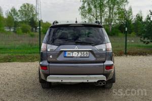 Pelēks Mitsubishi Outlander 2010 Rīga, ar dzinēja tilpumu 2.20 L un nobraukumu 0 tūkst. km par 2100 €, foto 5 vietnē AUTOMOTO.COM.LV