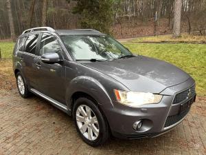 Grey Mitsubishi Outlander 2010 in Vilnius, with an engine capacity of 2.18 L and mileage of 383 thousand km for 4599 €, photo 3 on AUTOMOTO.COM.LV