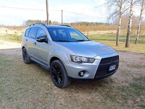 Pelēks Mitsubishi Outlander 2010 Viļņa, ar dzinēja tilpumu 2.40 L un nobraukumu 210 tūkst. km par 3000 €, foto  vietnē AUTOMOTO.COM.LV
