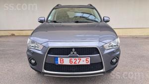 Pelēks Mitsubishi Outlander 2010 Ogre, ar dzinēja tilpumu 2.20 L un nobraukumu 213 tūkst. km par 5750 €, foto 4 vietnē AUTOMOTO.COM.LV
