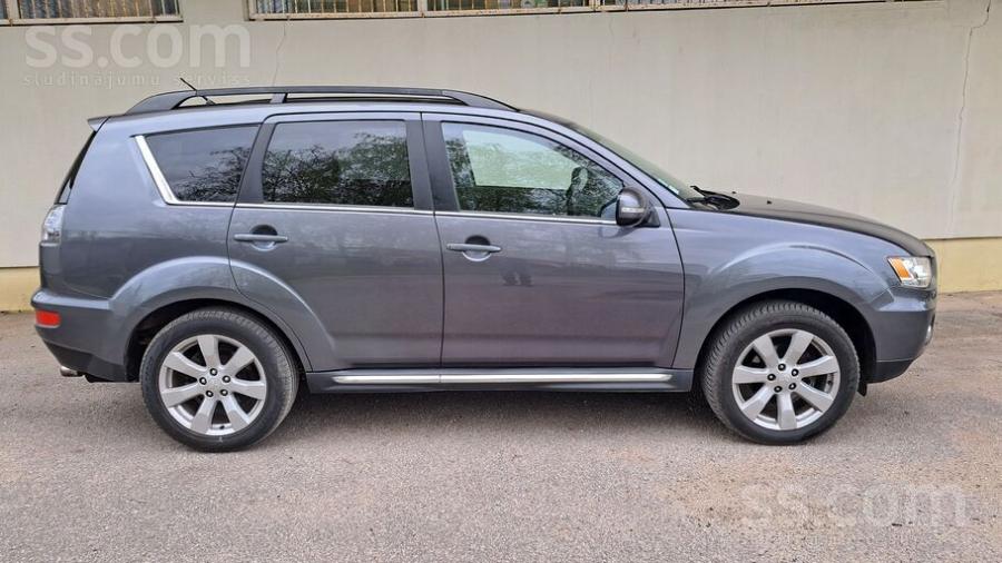 Pelēks Mitsubishi Outlander 2010 Ogre, ar dzinēja tilpumu 2.20 L un nobraukumu 213 tūkst. km par 5750 €, foto 7 vietnē AUTOMOTO.COM.LV