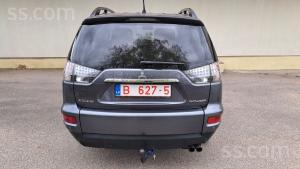 Pelēks Mitsubishi Outlander 2010 Ogre, ar dzinēja tilpumu 2.20 L un nobraukumu 213 tūkst. km par 5750 €, foto 9 vietnē AUTOMOTO.COM.LV