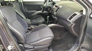 Pelēks Mitsubishi Outlander 2010 Ogre, ar dzinēja tilpumu 2.20 L un nobraukumu 213 tūkst. km par 5750 €, foto 17 vietnē AUTOMOTO.COM.LV