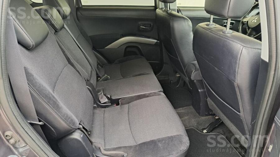 Pelēks Mitsubishi Outlander 2010 Ogre, ar dzinēja tilpumu 2.20 L un nobraukumu 213 tūkst. km par 5750 €, foto 18 vietnē AUTOMOTO.COM.LV