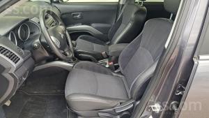 Pelēks Mitsubishi Outlander 2010 Ogre, ar dzinēja tilpumu 2.20 L un nobraukumu 213 tūkst. km par 5750 €, foto 21 vietnē AUTOMOTO.COM.LV