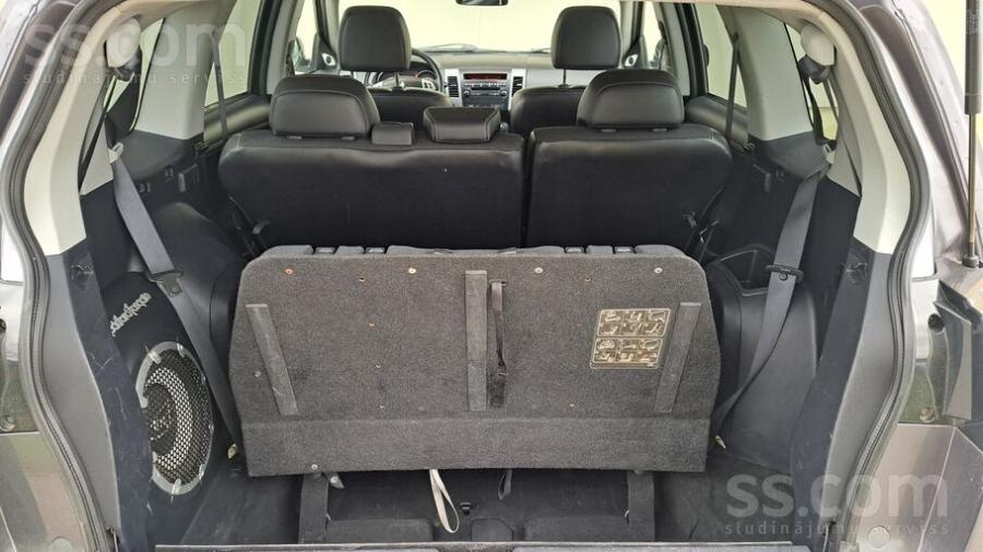 Pelēks Mitsubishi Outlander 2010 Ogre, ar dzinēja tilpumu 2.20 L un nobraukumu 213 tūkst. km par 5750 €, foto 22 vietnē AUTOMOTO.COM.LV