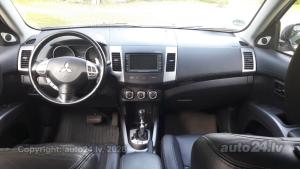 Pelēks Mitsubishi Outlander 2010 Jehvi, ar dzinēja tilpumu 2.20 L un nobraukumu 335 tūkst. km par 3900 €, foto  vietnē AUTOMOTO.COM.LV