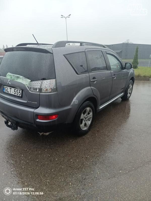 Grey Mitsubishi Outlander 2010 in Klaipeda, with an engine capacity of 2.40 L and mileage of 350 thousand km for 4999 €, photo 6 on AUTOMOTO.COM.LV