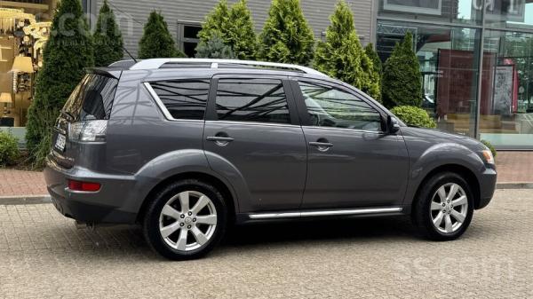 Pelēks Mitsubishi Outlander 2010 Rīga, ar dzinēja tilpumu 2.30 L un nobraukumu 238 tūkst. km par 3400 €, foto 2 vietnē AUTOMOTO.COM.LV