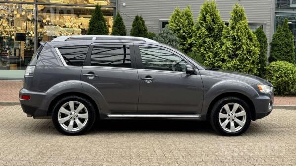 Pelēks Mitsubishi Outlander 2010 Rīga, ar dzinēja tilpumu 2.30 L un nobraukumu 238 tūkst. km par 3400 €, foto 5 vietnē AUTOMOTO.COM.LV