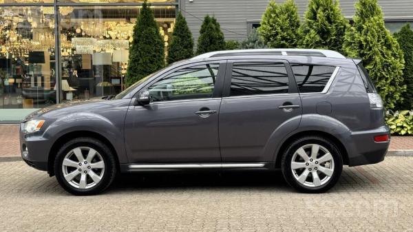 Pelēks Mitsubishi Outlander 2010 Rīga, ar dzinēja tilpumu 2.30 L un nobraukumu 238 tūkst. km par 3400 €, foto 6 vietnē AUTOMOTO.COM.LV