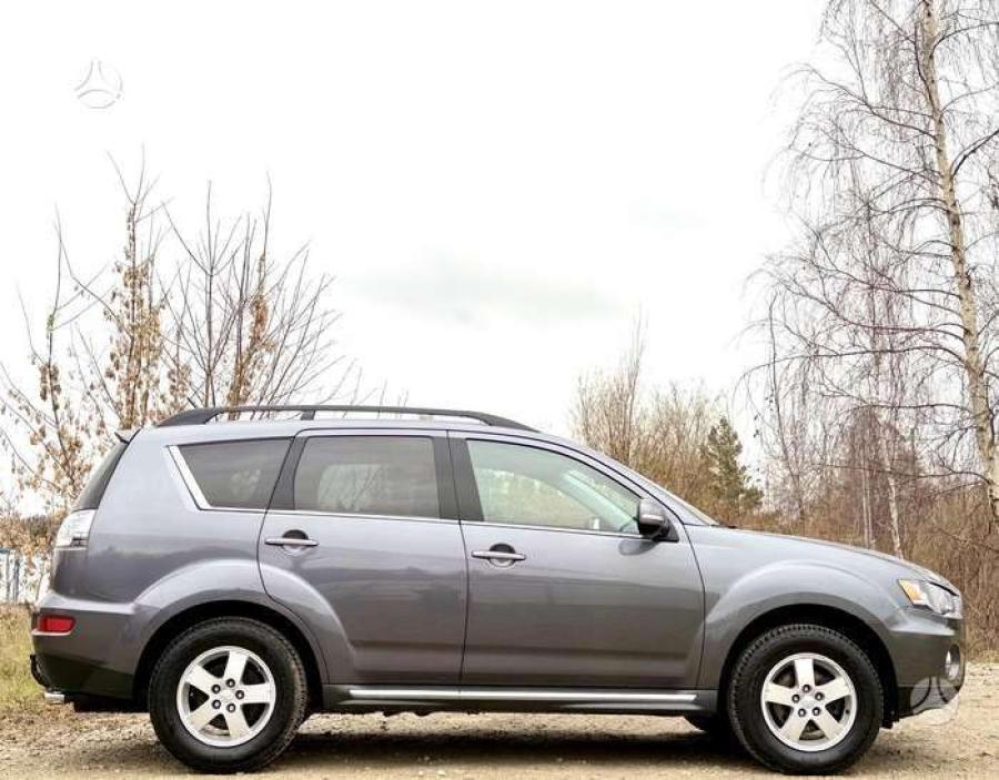 Grey Mitsubishi Outlander 2011 in Siauliai, with an engine capacity of 2.27 L and mileage of 201 thousand km for 7450 €, photo 14 on AUTOMOTO.COM.LV
