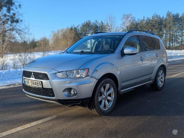 Pelēks Mitsubishi Outlander 2011 Kauņa, ar dzinēja tilpumu 2.27 L un nobraukumu 276 tūkst. km par 2950 €, foto 3 vietnē AUTOMOTO.COM.LV