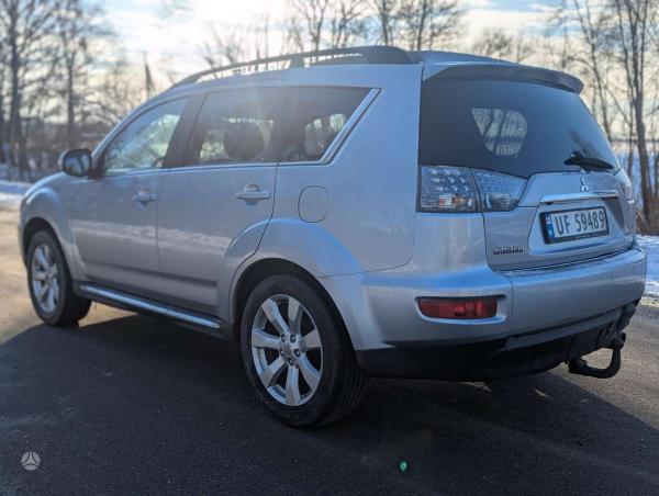 Pelēks Mitsubishi Outlander 2011 Kauņa, ar dzinēja tilpumu 2.27 L un nobraukumu 276 tūkst. km par 2950 €, foto 6 vietnē AUTOMOTO.COM.LV