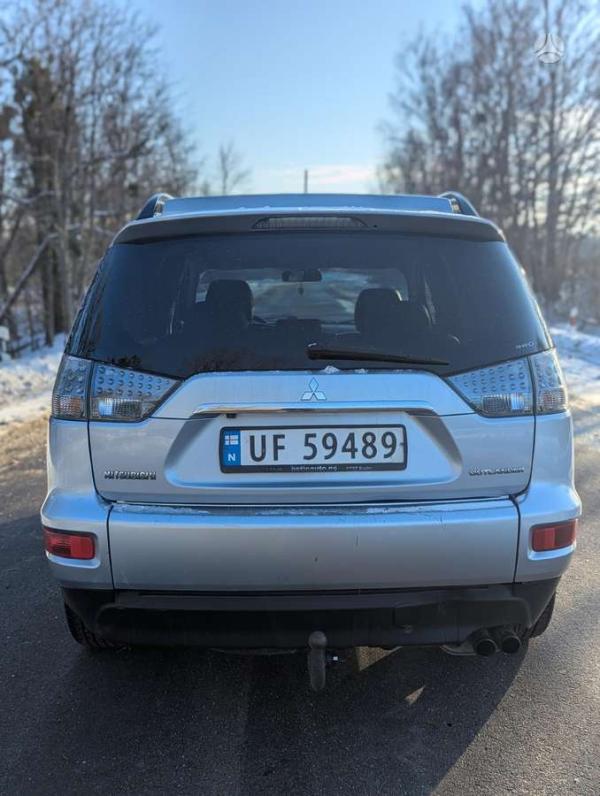 Pelēks Mitsubishi Outlander 2011 Kauņa, ar dzinēja tilpumu 2.27 L un nobraukumu 276 tūkst. km par 2950 €, foto 8 vietnē AUTOMOTO.COM.LV