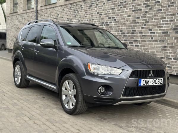 Pelēks Mitsubishi Outlander 2011 Tukums, ar dzinēja tilpumu 2.20 L un nobraukumu 187 tūkst. km par 6990 €, foto 1 vietnē AUTOMOTO.COM.LV