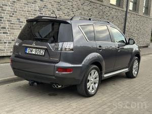 Pelēks Mitsubishi Outlander 2011 Tukums, ar dzinēja tilpumu 2.20 L un nobraukumu 187 tūkst. km par 6990 €, foto 5 vietnē AUTOMOTO.COM.LV