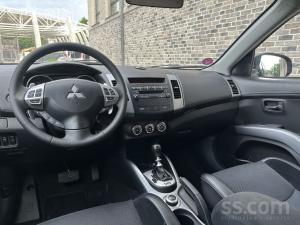 Pelēks Mitsubishi Outlander 2011 Tukums, ar dzinēja tilpumu 2.20 L un nobraukumu 187 tūkst. km par 6990 €, foto 12 vietnē AUTOMOTO.COM.LV