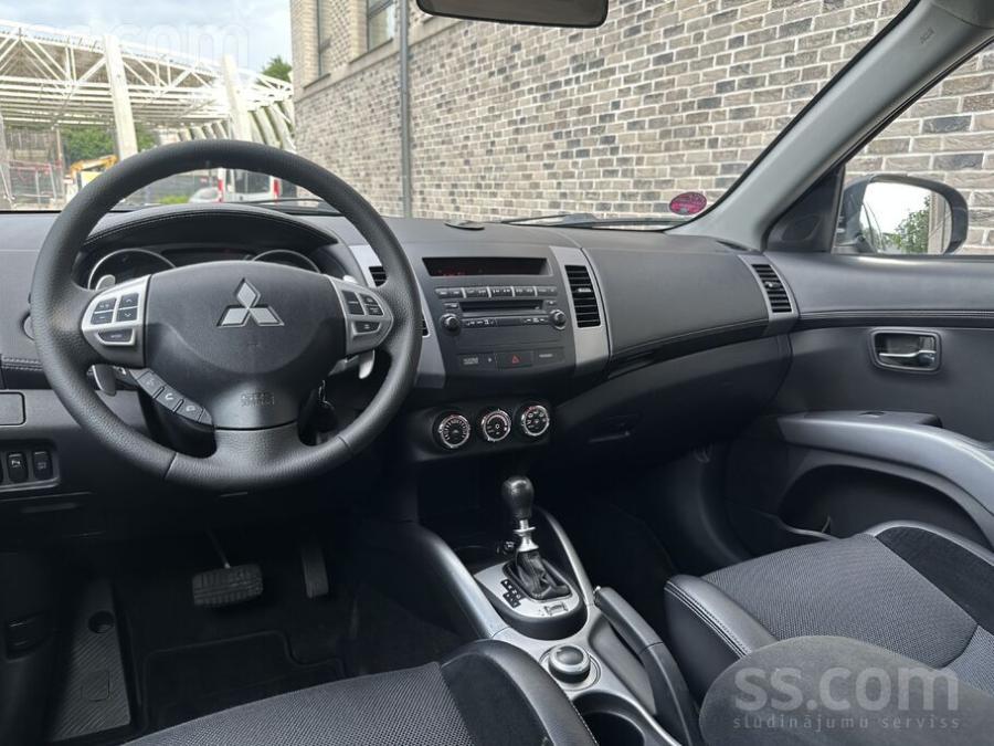 Pelēks Mitsubishi Outlander 2011 Tukums, ar dzinēja tilpumu 2.20 L un nobraukumu 187 tūkst. km par 6990 €, foto 12 vietnē AUTOMOTO.COM.LV