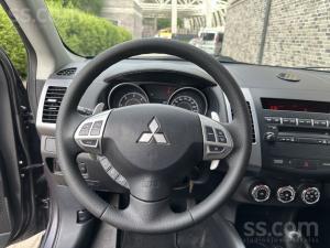 Pelēks Mitsubishi Outlander 2011 Tukums, ar dzinēja tilpumu 2.20 L un nobraukumu 187 tūkst. km par 6990 €, foto 19 vietnē AUTOMOTO.COM.LV