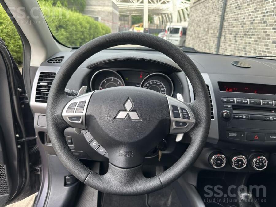 Pelēks Mitsubishi Outlander 2011 Tukums, ar dzinēja tilpumu 2.20 L un nobraukumu 187 tūkst. km par 6990 €, foto 19 vietnē AUTOMOTO.COM.LV