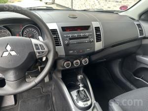 Pelēks Mitsubishi Outlander 2011 Tukums, ar dzinēja tilpumu 2.20 L un nobraukumu 187 tūkst. km par 6990 €, foto 24 vietnē AUTOMOTO.COM.LV