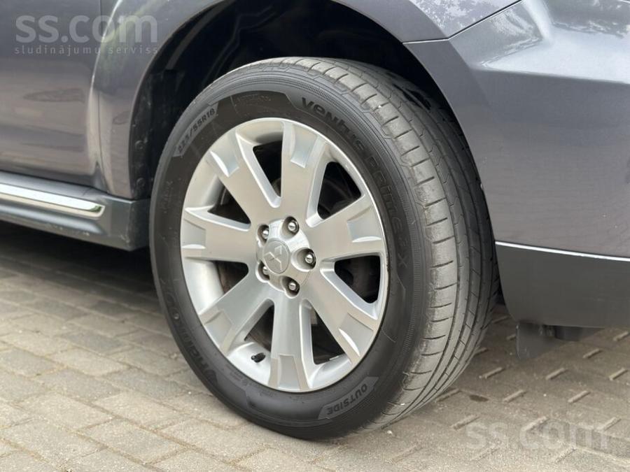Pelēks Mitsubishi Outlander 2011 Tukums, ar dzinēja tilpumu 2.20 L un nobraukumu 187 tūkst. km par 6990 €, foto 30 vietnē AUTOMOTO.COM.LV