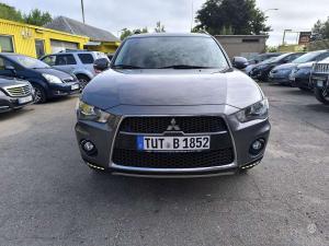Pelēks Mitsubishi Outlander 2011 Šauļi, ar dzinēja tilpumu 2.27 L un nobraukumu 309 tūkst. km par 4950 €, foto 4 vietnē AUTOMOTO.COM.LV