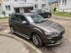 Pelēks Mitsubishi Outlander 2011 Rīga, ar dzinēja tilpumu 2.40 L un nobraukumu 205 tūkst. km par 5250 €, foto 5 vietnē AUTOMOTO.COM.LV