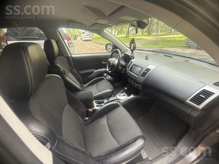 Pelēks Mitsubishi Outlander 2011 Rīga, ar dzinēja tilpumu 2.40 L un nobraukumu 205 tūkst. km par 5250 €, foto 8 vietnē AUTOMOTO.COM.LV