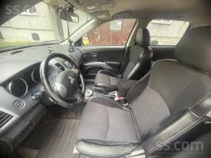 Pelēks Mitsubishi Outlander 2011 Rīga, ar dzinēja tilpumu 2.40 L un nobraukumu 205 tūkst. km par 5250 €, foto 10 vietnē AUTOMOTO.COM.LV