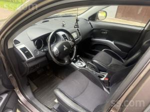 Pelēks Mitsubishi Outlander 2011 Rīga, ar dzinēja tilpumu 2.40 L un nobraukumu 205 tūkst. km par 5250 €, foto 12 vietnē AUTOMOTO.COM.LV