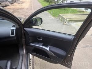 Pelēks Mitsubishi Outlander 2011 Rīga, ar dzinēja tilpumu 2.40 L un nobraukumu 205 tūkst. km par 5250 €, foto 13 vietnē AUTOMOTO.COM.LV