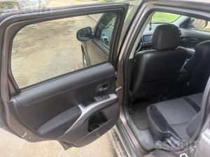 Pelēks Mitsubishi Outlander 2011 Rīga, ar dzinēja tilpumu 2.40 L un nobraukumu 205 tūkst. km par 5250 €, foto 16 vietnē AUTOMOTO.COM.LV