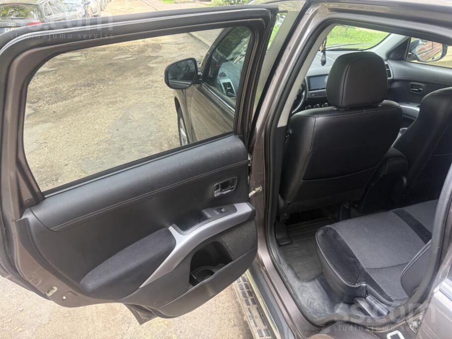 Pelēks Mitsubishi Outlander 2011 Rīga, ar dzinēja tilpumu 2.40 L un nobraukumu 205 tūkst. km par 5250 €, foto 16 vietnē AUTOMOTO.COM.LV