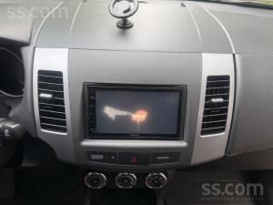 Pelēks Mitsubishi Outlander 2011 Rīga, ar dzinēja tilpumu 2.40 L un nobraukumu 205 tūkst. km par 5250 €, foto 19 vietnē AUTOMOTO.COM.LV