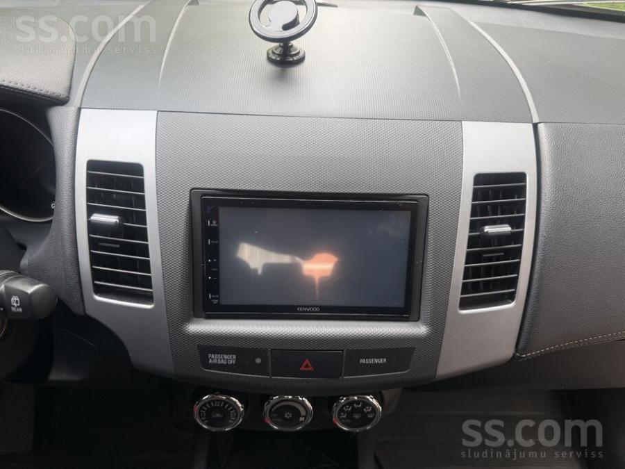 Pelēks Mitsubishi Outlander 2011 Rīga, ar dzinēja tilpumu 2.40 L un nobraukumu 205 tūkst. km par 5250 €, foto 19 vietnē AUTOMOTO.COM.LV