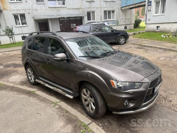 Pelēks Mitsubishi Outlander 2011 Rīga, ar dzinēja tilpumu 2.40 L un nobraukumu 205 tūkst. km par 5250 €, foto 8 vietnē AUTOMOTO.COM.LV