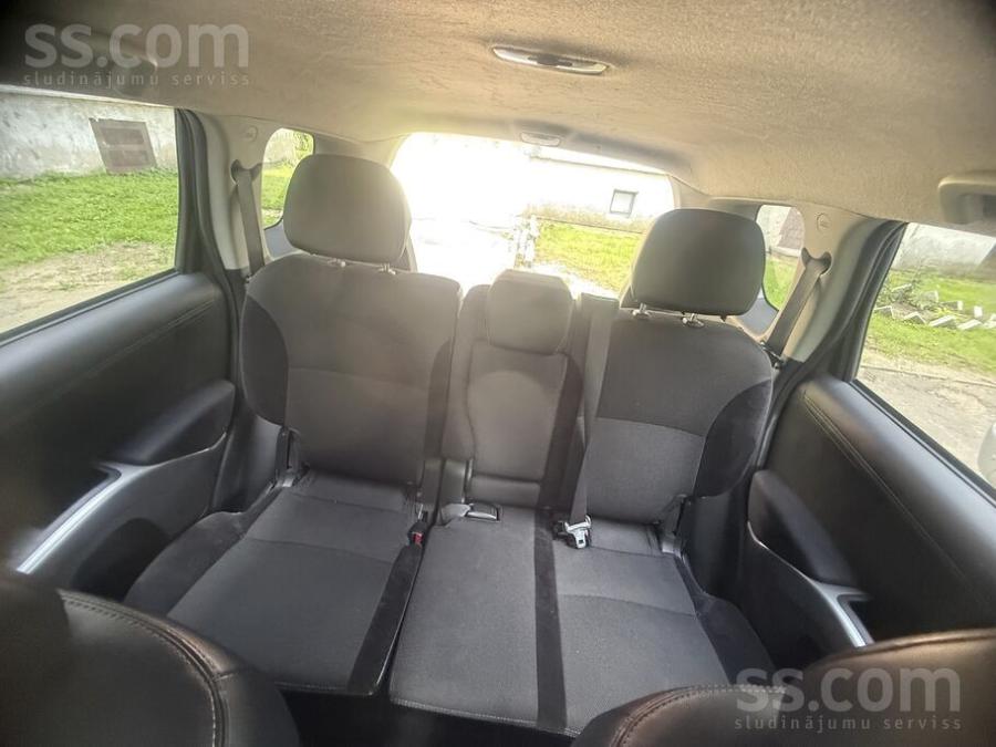 Grey Mitsubishi Outlander 2011 in Riga, with an engine capacity of 2.40 L and mileage of 206 thousand km for 5200 €, photo 11 on AUTOMOTO.COM.LV