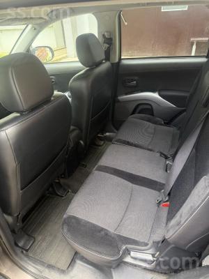 Grey Mitsubishi Outlander 2011 in Riga, with an engine capacity of 2.40 L and mileage of 206 thousand km for 5200 €, photo 12 on AUTOMOTO.COM.LV