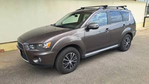 Grey Mitsubishi Outlander 2011 in Ogre, with an engine capacity of 2.20 L and mileage of 261 thousand km for 5650 €, photo  on AUTOMOTO.COM.LV