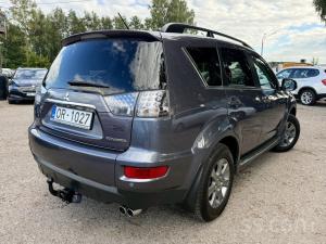 Grey Mitsubishi Outlander 2011 in Riga, with an engine capacity of 2.20 L and mileage of 0 thousand km for 5490 €, photo 3 on AUTOMOTO.COM.LV