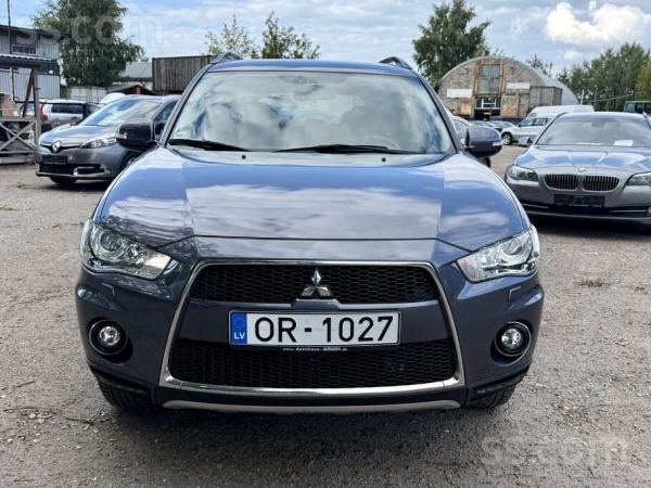 Pelēks Mitsubishi Outlander 2011 Rīga, ar dzinēja tilpumu 2.20 L un nobraukumu 0 tūkst. km par 5490 €, foto 5 vietnē AUTOMOTO.COM.LV