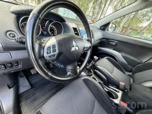 Grey Mitsubishi Outlander 2011 in Riga, with an engine capacity of 2.20 L and mileage of 0 thousand km for 5490 €, photo 18 on AUTOMOTO.COM.LV