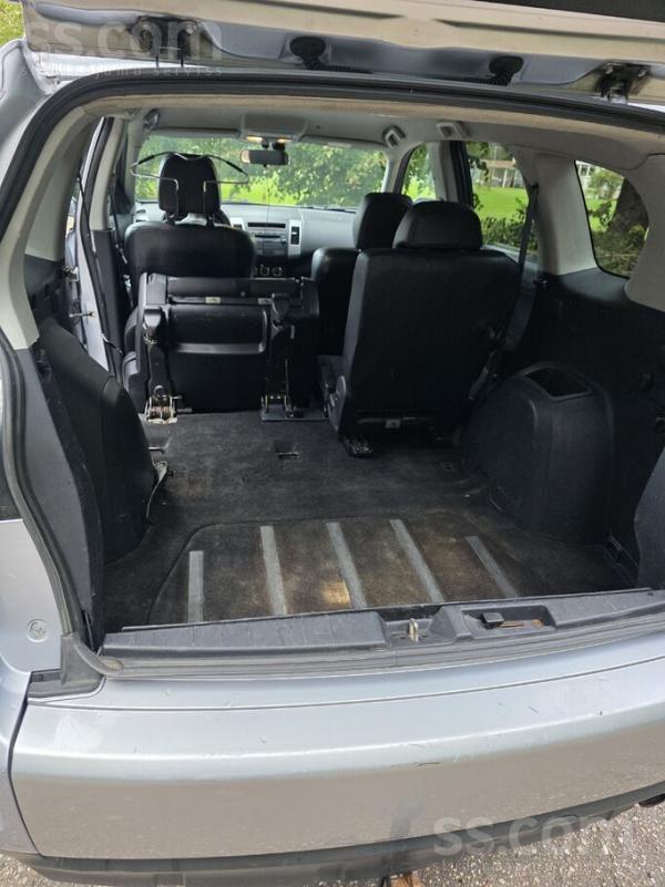 Pelēks Mitsubishi Outlander 2011 Rīga, ar dzinēja tilpumu 2.20 L un nobraukumu 330 tūkst. km par 4200 €, foto 6 vietnē AUTOMOTO.COM.LV