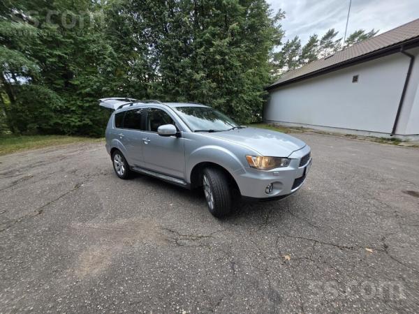 Pelēks Mitsubishi Outlander 2011 Rīga, ar dzinēja tilpumu 2.20 L un nobraukumu 330 tūkst. km par 4200 €, foto 7 vietnē AUTOMOTO.COM.LV
