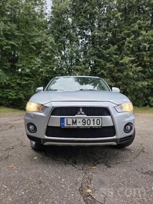 Grey Mitsubishi Outlander 2011 in Riga, with an engine capacity of 2.20 L and mileage of 330 thousand km for 4200 €, photo 9 on AUTOMOTO.COM.LV