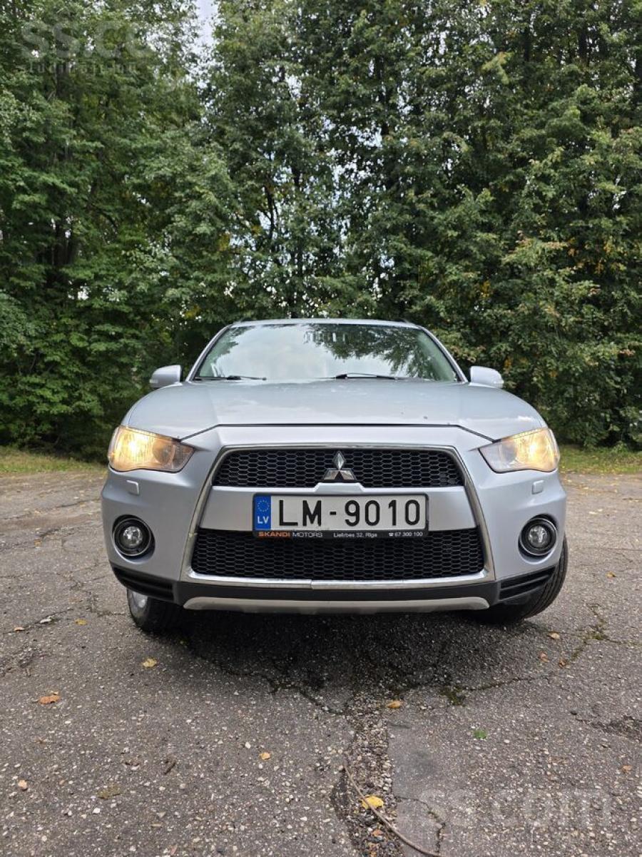Grey Mitsubishi Outlander 2011 in Riga, with an engine capacity of 2.20 L and mileage of 330 thousand km for 4200 €, photo 9 on AUTOMOTO.COM.LV